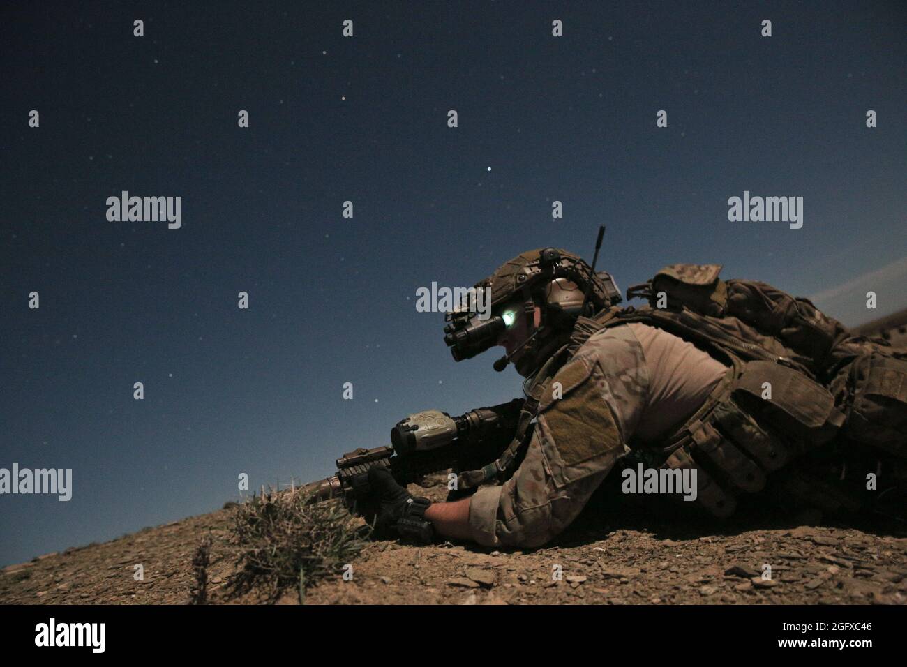 A U.S. special operations forces member conducts combat operations in ...
