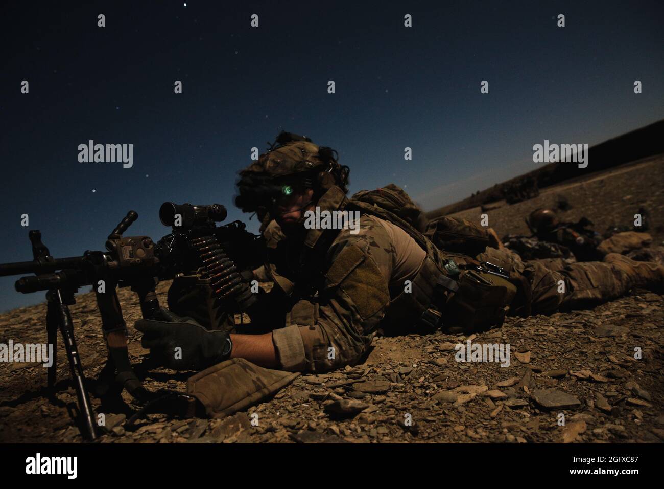 A U.S. special operations forces member conducts combat operations in ...