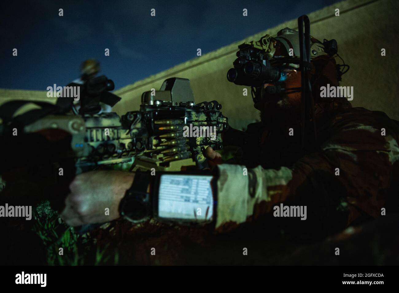 A U.S. special operations forces member conducts combat operations in ...