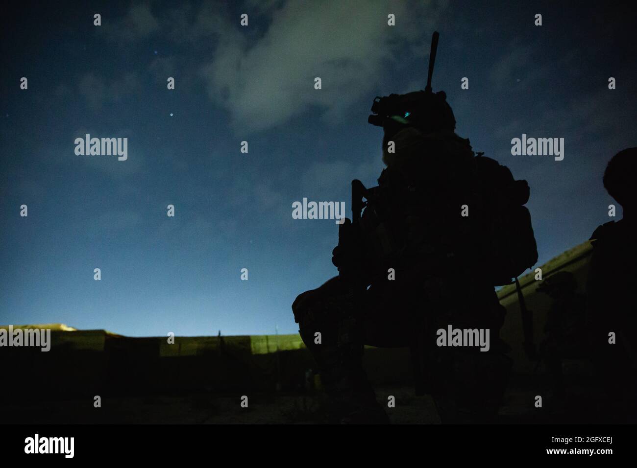 A U.S. special operations forces member conducts combat operations in ...