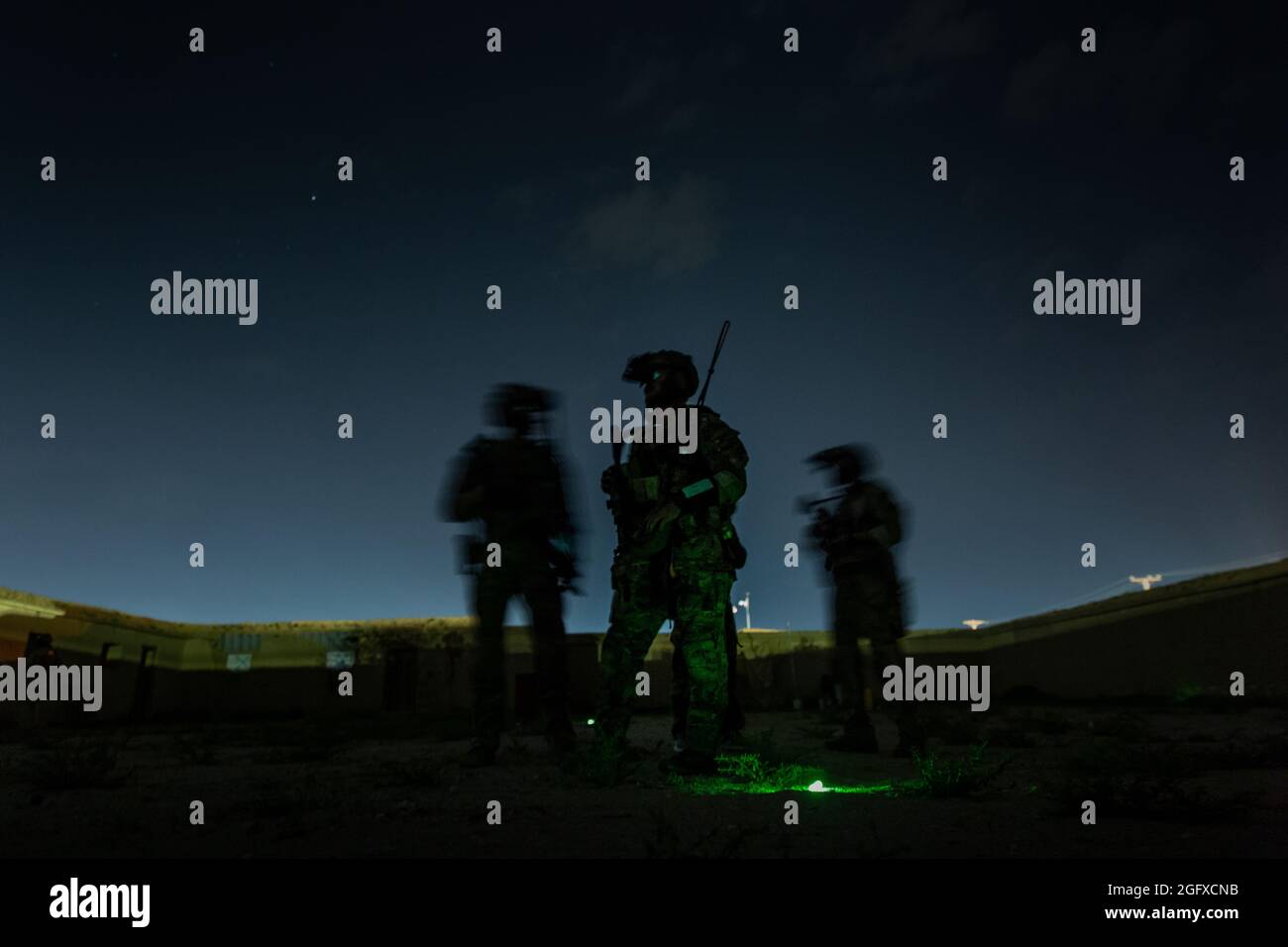 U.S. special operations forces members conduct combat operations in ...