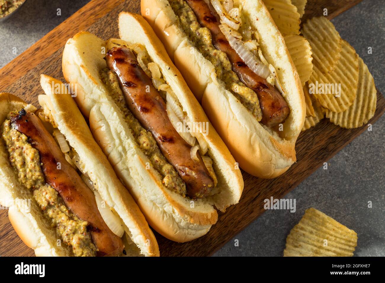 Homemade German Bratwurst Sandwich with Mustard and Onion Stock Photo ...