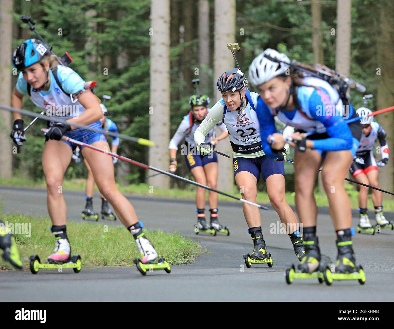 Yuliia Dzhima of Ukraine (centre) in action during the IBU summer ...