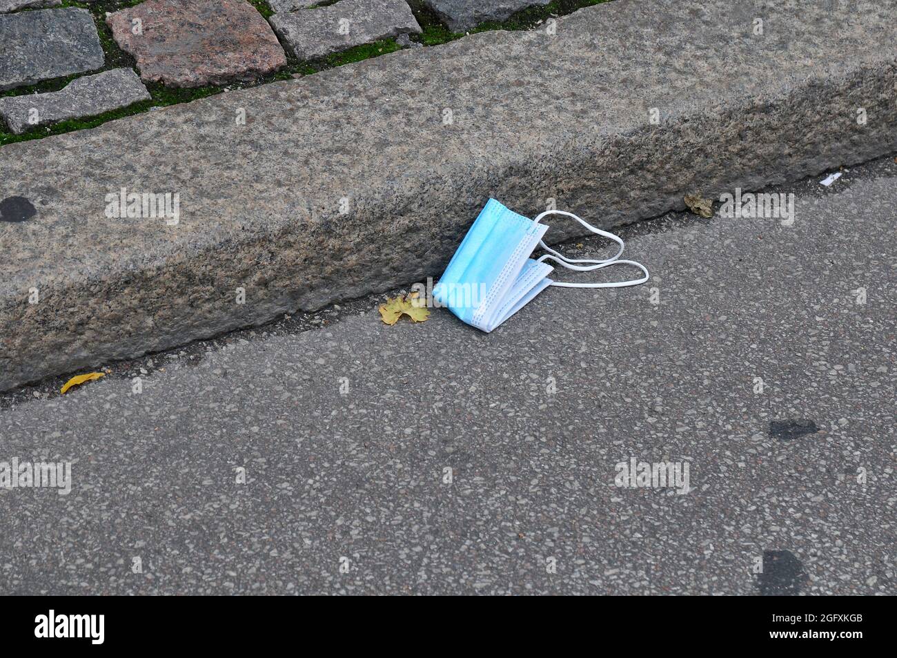 Copenhagen, Denmark., 27 August 2021, Face mask as trsh in nation side ...