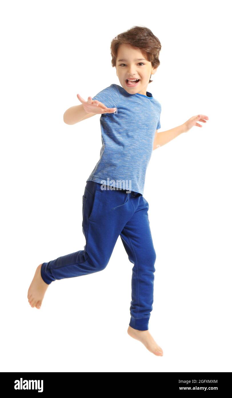 Cute emotional little boy jumping on white background Stock Photo - Alamy