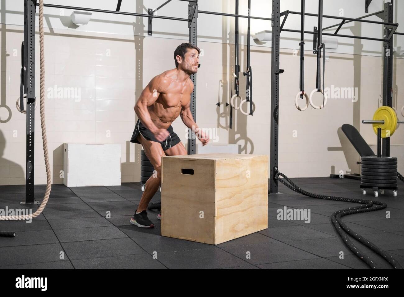 Man fit in box hi-res stock photography and images - Alamy