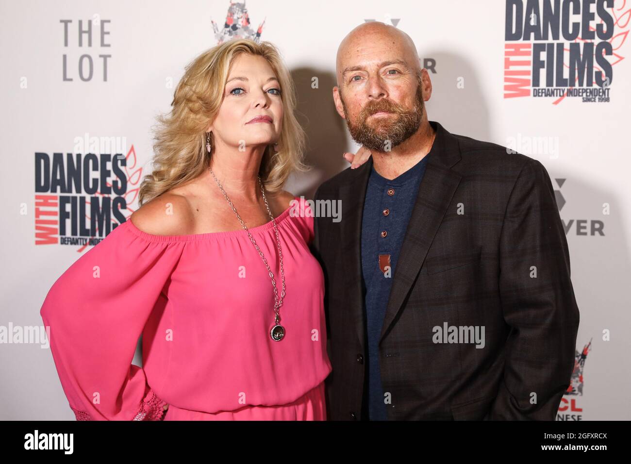 Kara Slocum and Guy Noland arrive at the premiere of "The Art of ...