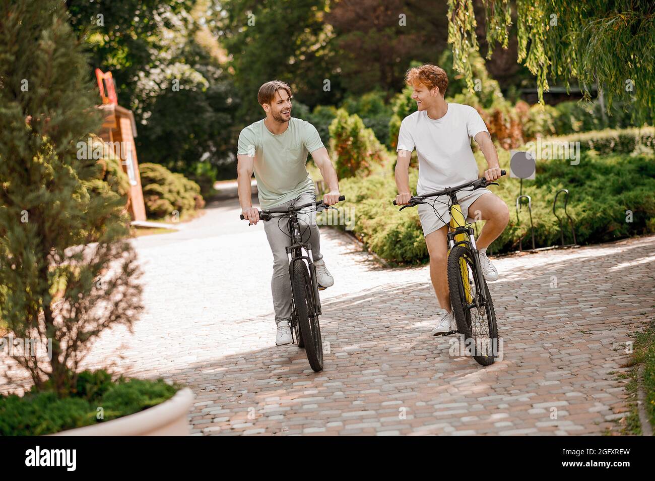 Two men cycling hi-res stock photography and images - Alamy
