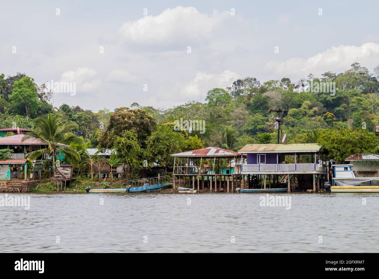 Riverside houses in Ell Castillo village at San Juan river, Nicaragua ...