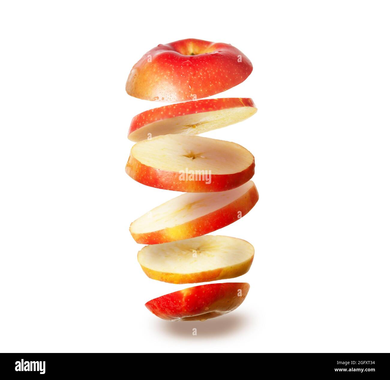 levitating sliced red apple isolated on white background Stock Photo ...