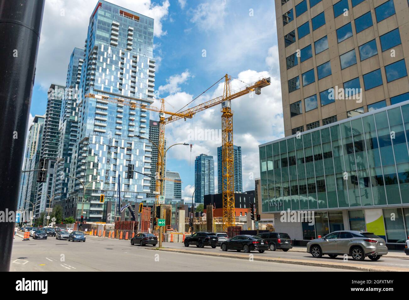 Construction of the modern condo buildings with huge windows and ...