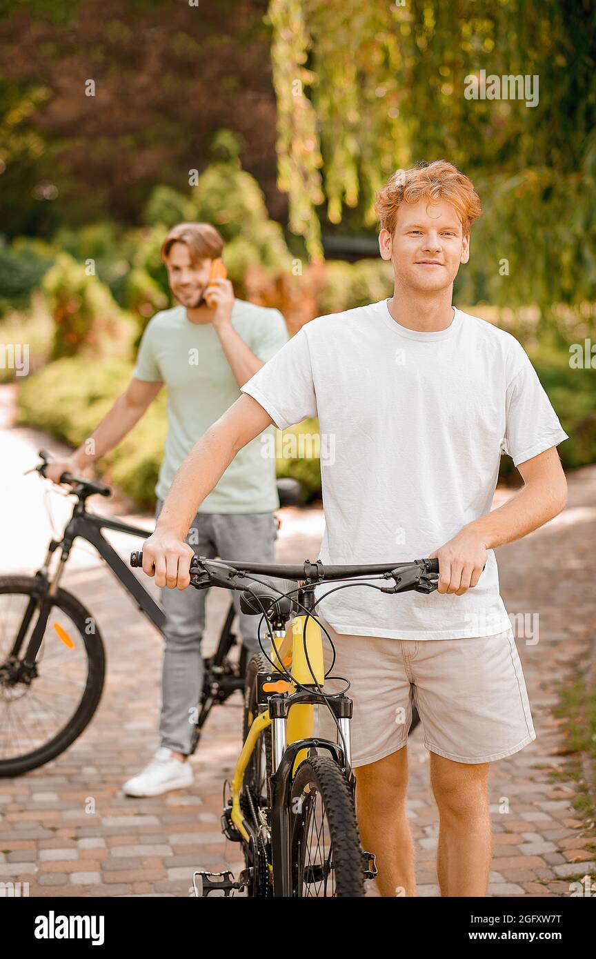Two bicycle riders after the morning workout Stock Photo - Alamy