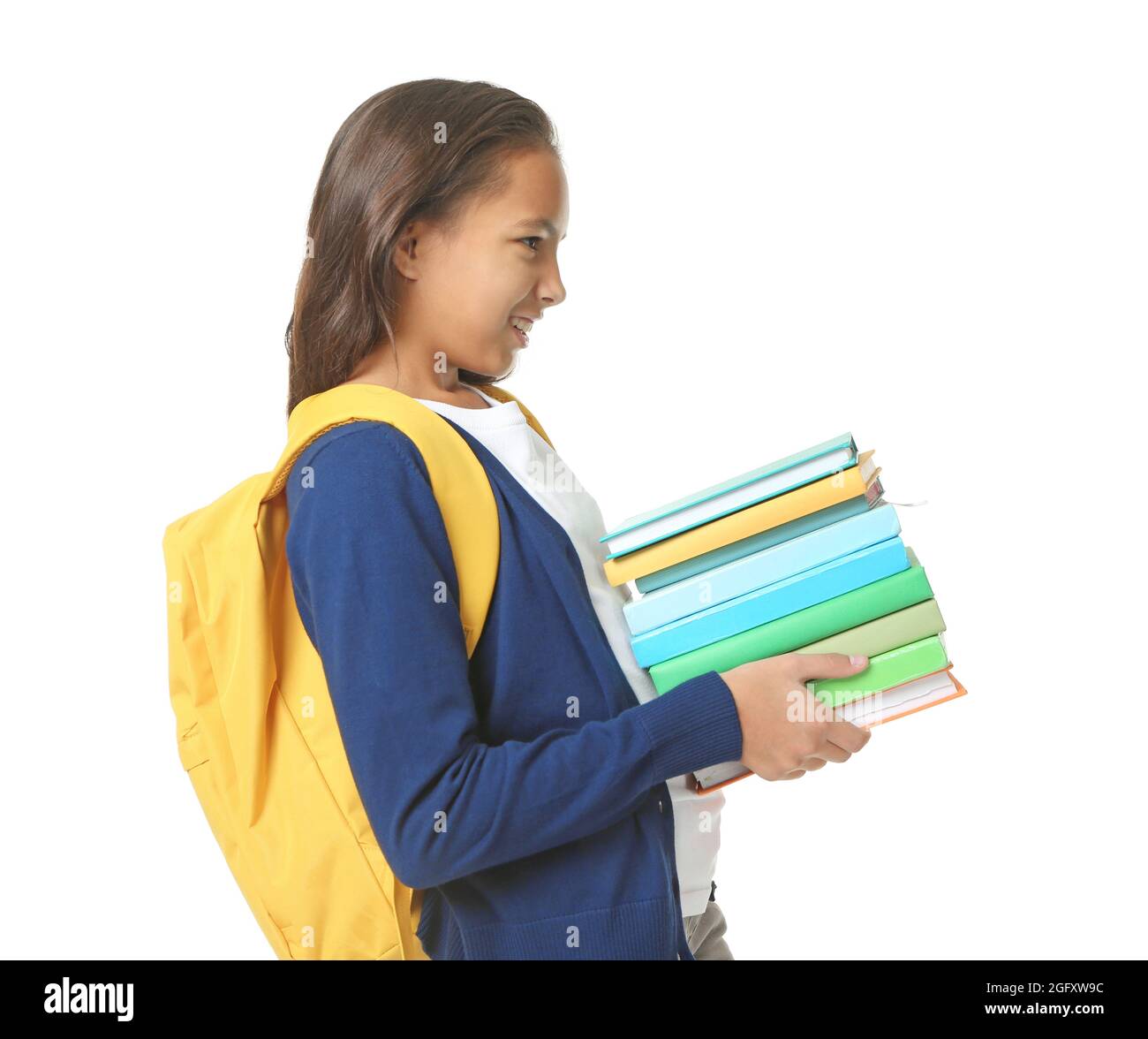 Cute schoolgirl with books on white background Stock Photo - Alamy