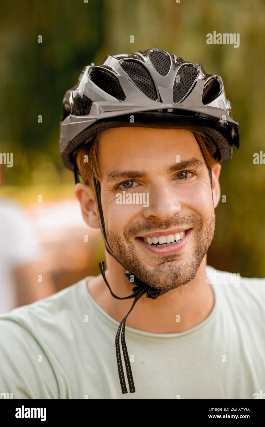 Cycling wearing a helmet hi-res stock photography and images - Alamy