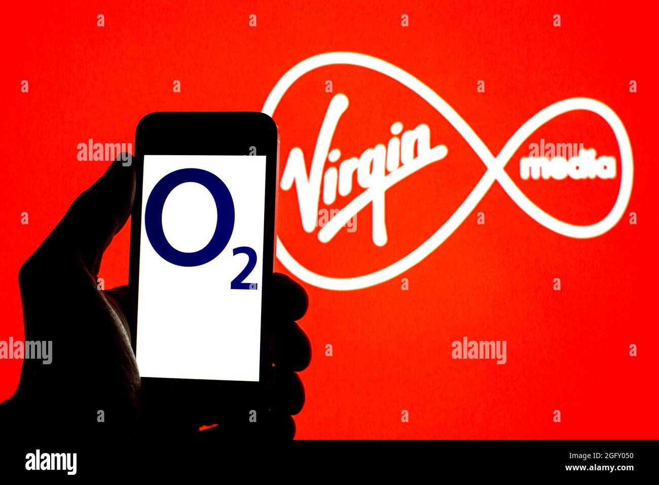 In this photo illustration a O2 logo seen displayed on a smartphone ...