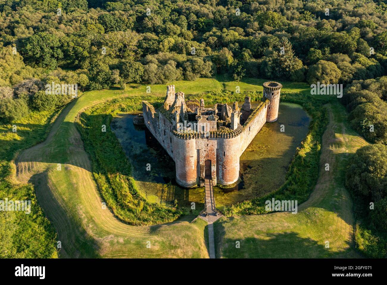 Moated Caerlaverock Castle ruins in Dumfries & Galloway, Scotland, UK ...
