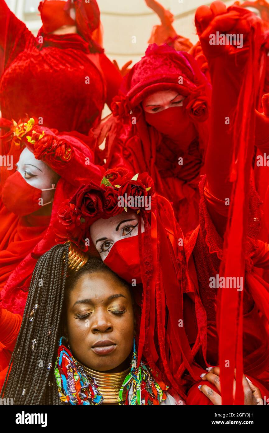 London, UK. 27th Aug, 2021. The red rebels arrive - The march arrives ...