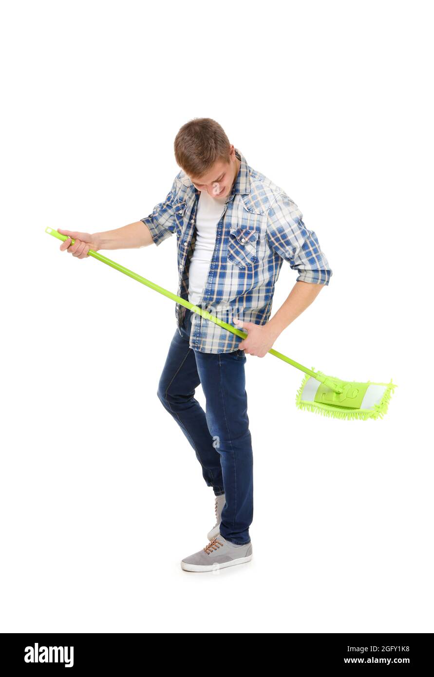 Young service man holding mop on white background Stock Photo - Alamy