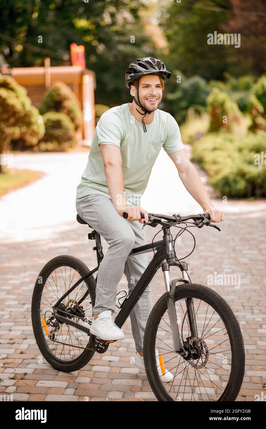 Cute bike rider enjoying his cycling workout Stock Photo - Alamy