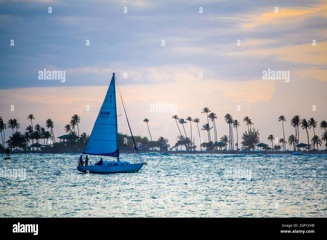 People sailing a boat near the shore of San Juan - Puerto Rico Stock ...