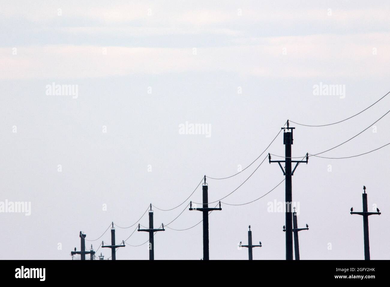 Overhead high voltage power lines Stock Photo - Alamy