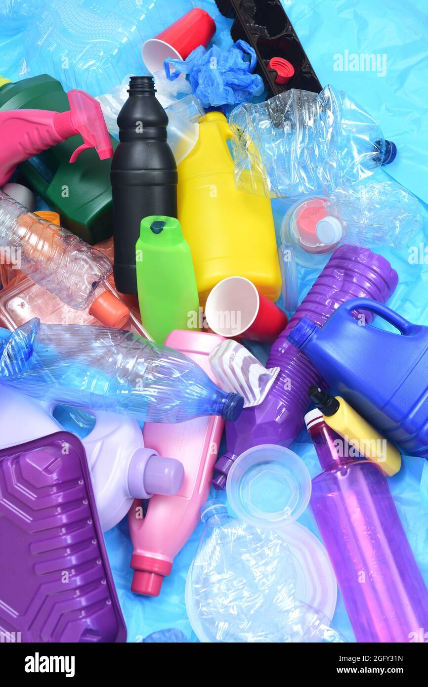group of plastic containers on blue plastic bags Stock Photo - Alamy