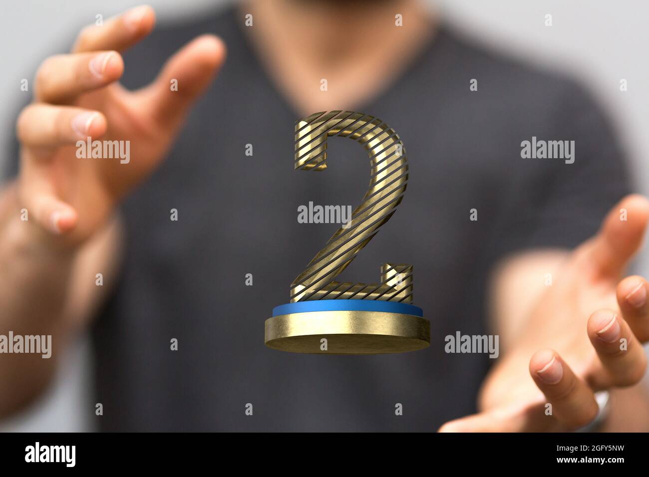 Closeup of 3D rendered number two in man's hands - success 2nd place ...