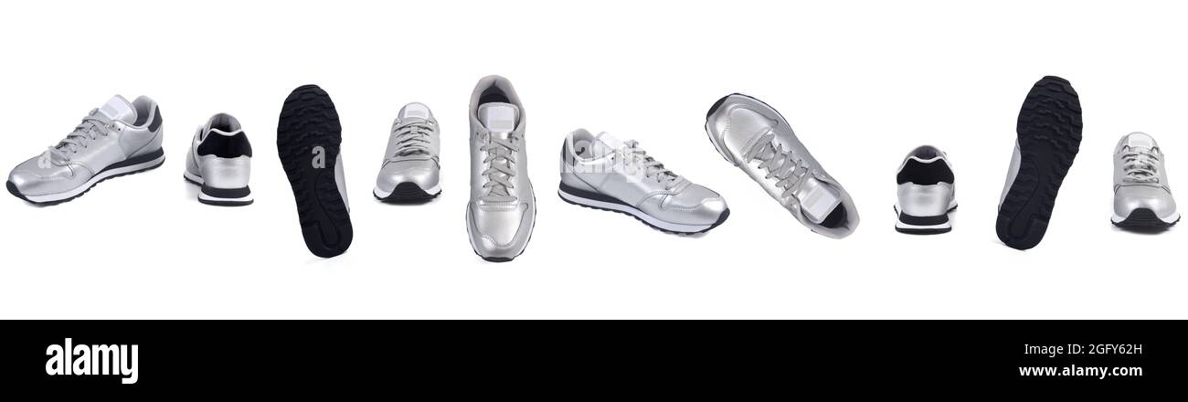 line of the same sport shoe in various poses on a white background ...