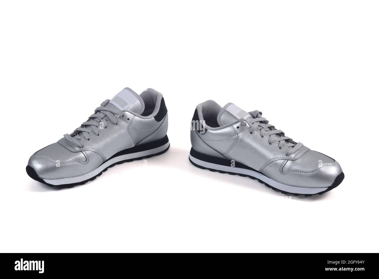 side view of some sports shoes on white background Stock Photo - Alamy