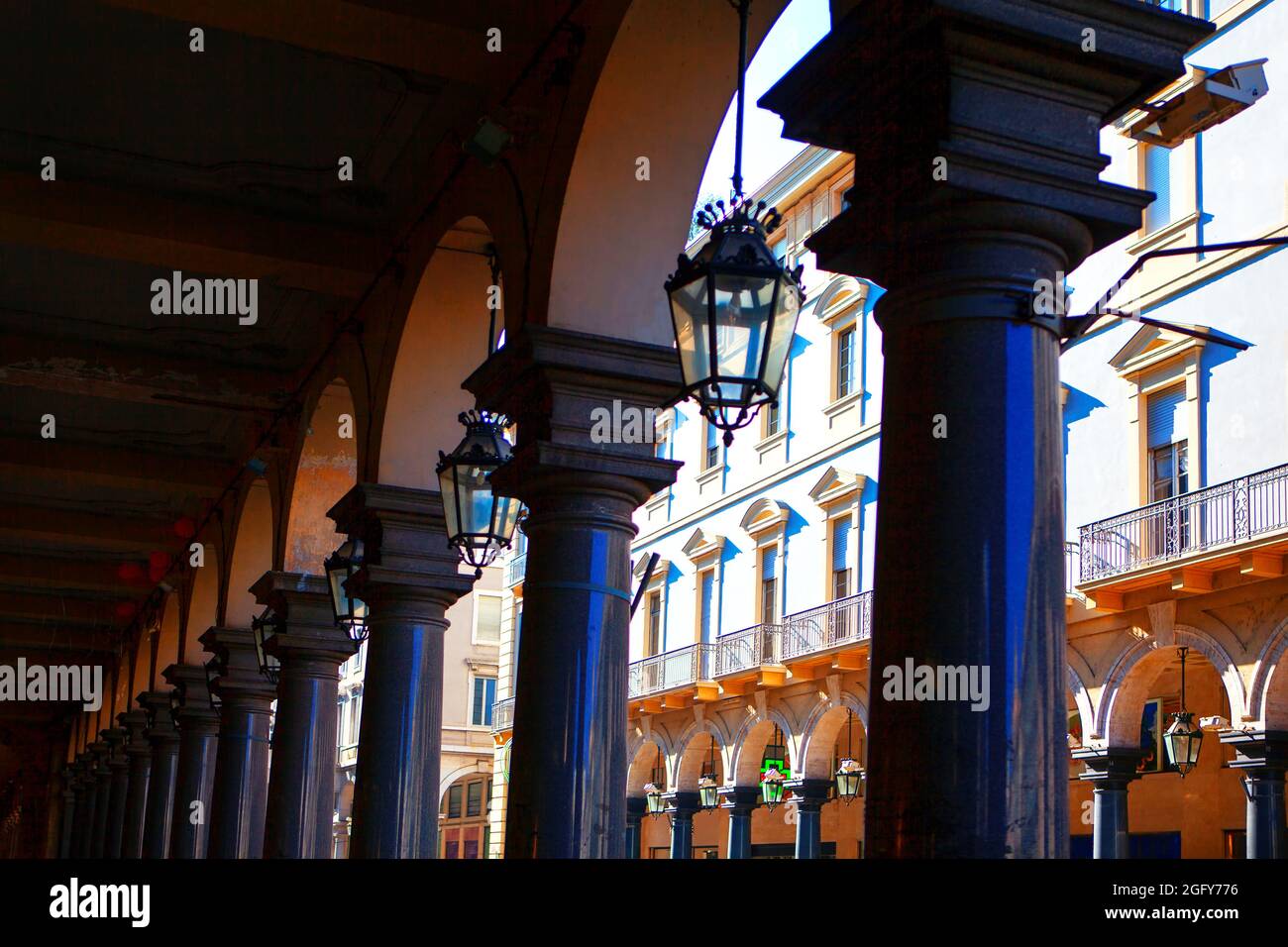Archway with columns in Turin Italy . Street corridor with arches and ...