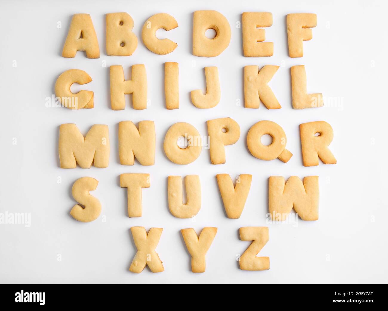 Cookie alphabet on white background Stock Photo - Alamy