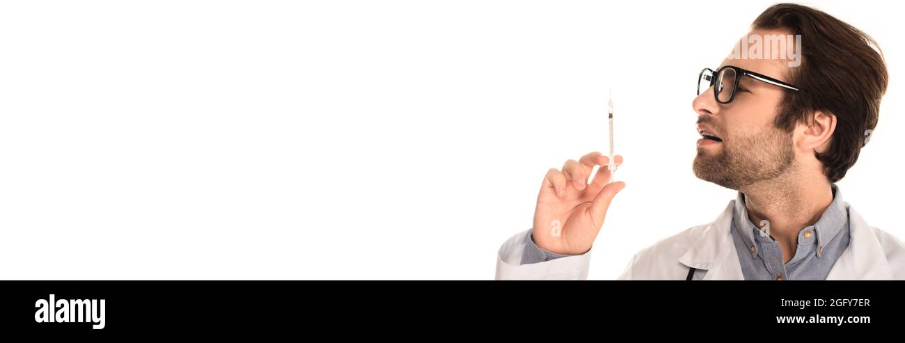 Side view of doctor holding syringe isolated on white, banner Stock ...