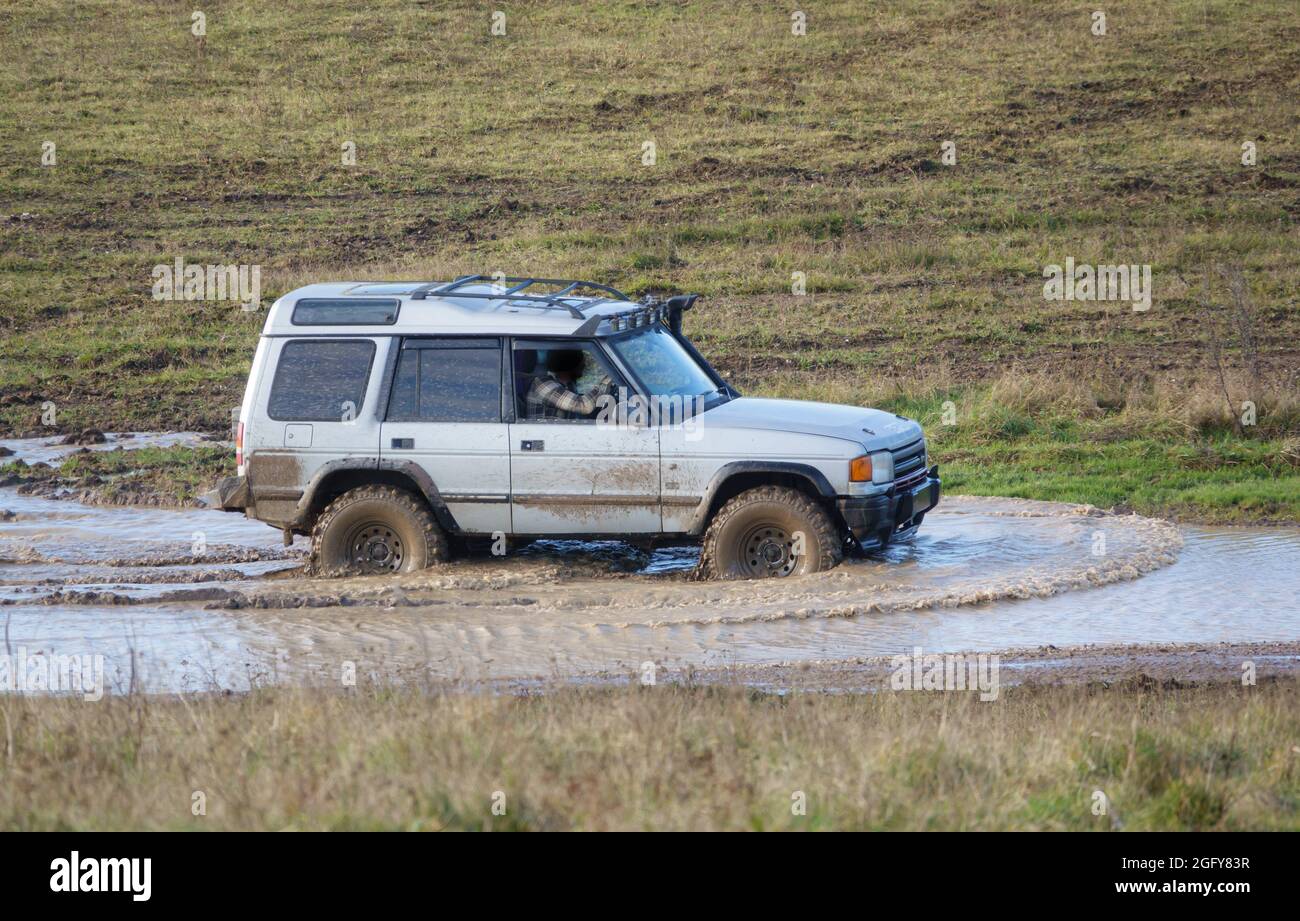 4x4 land rover discovery series II off roading, wading in deep water ...