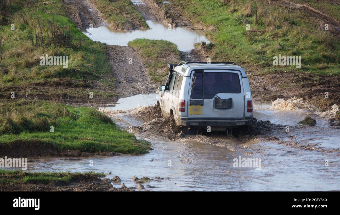 4x4 land rover discovery series II off roading, wading in deep water ...