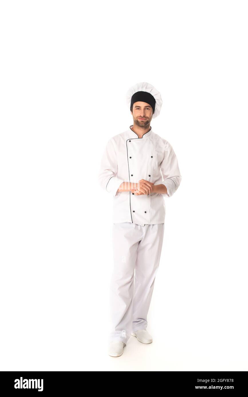 Full length of chef looking at camera on white background Stock Photo ...