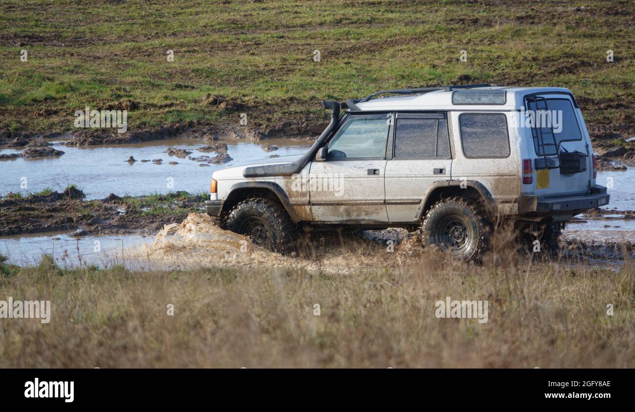 4x4 land rover discovery series II off roading, wading in deep water ...