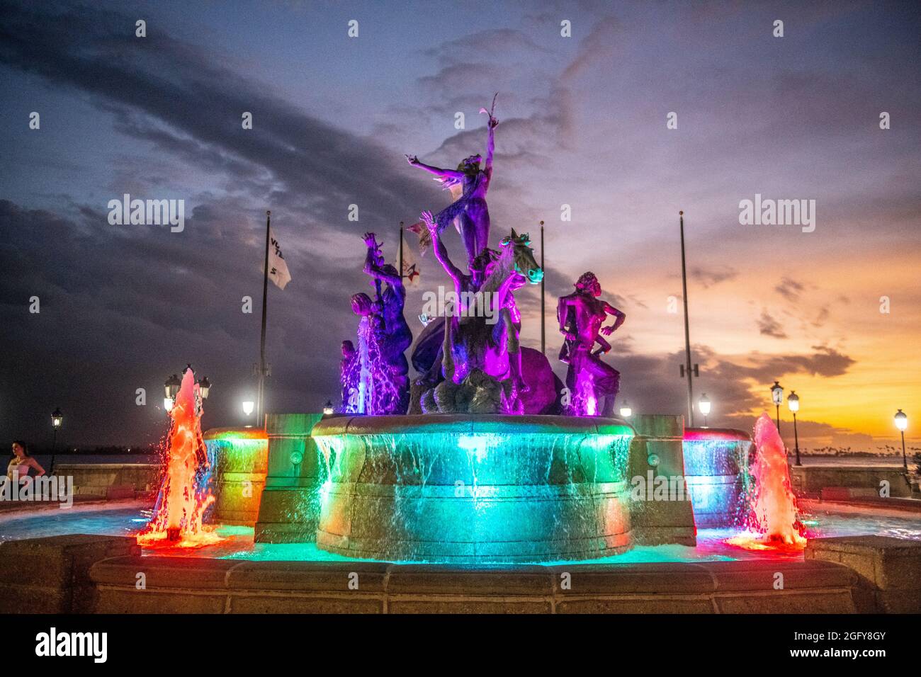 A San Juan fountain is illuminated with rainbow colors. - Puerto Rico ...