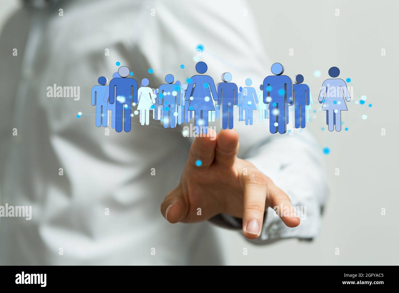 Person's hand touching 3D rendered people silhouettes Stock Photo - Alamy