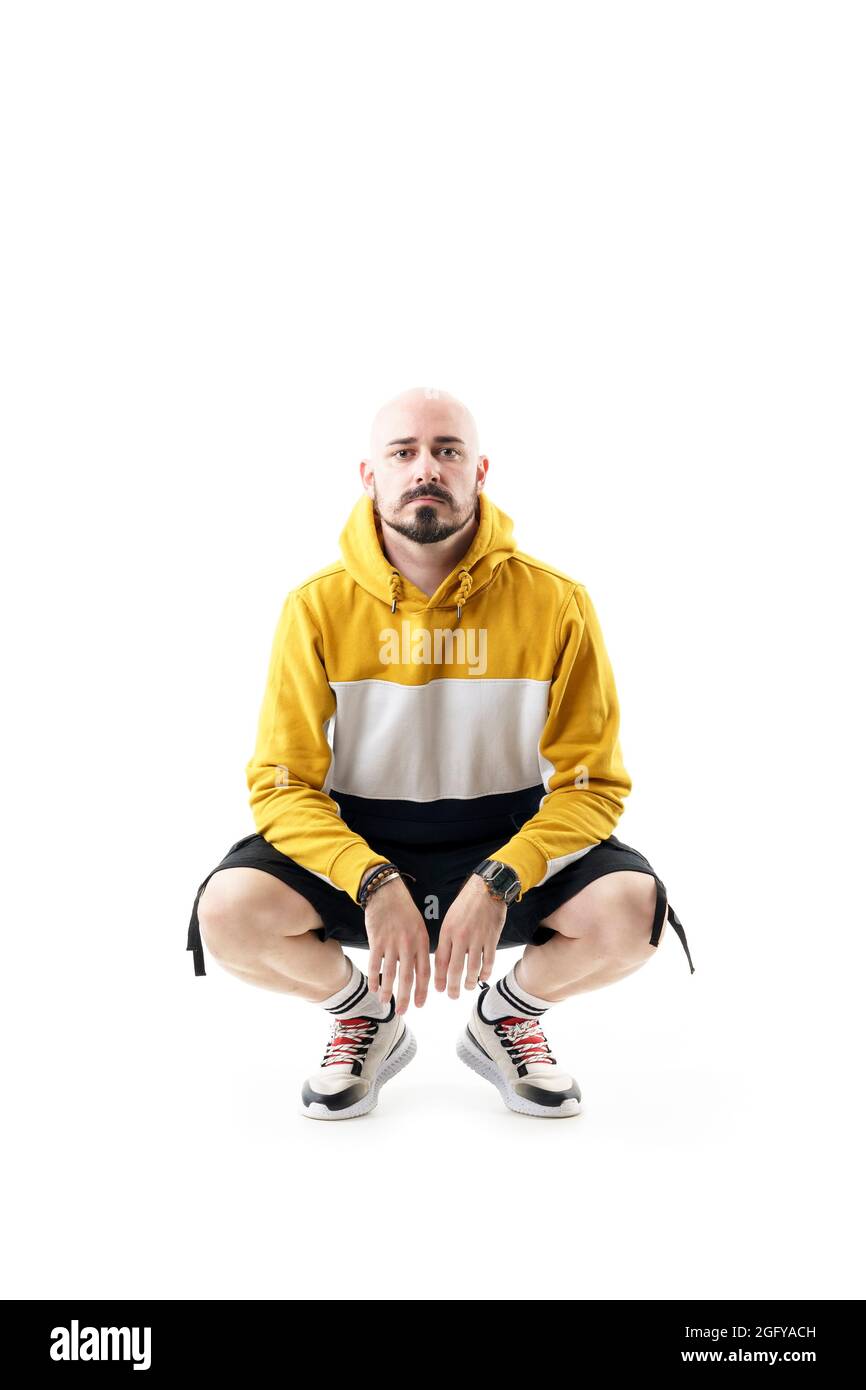 Crouching posing hi-res stock photography and images - Alamy