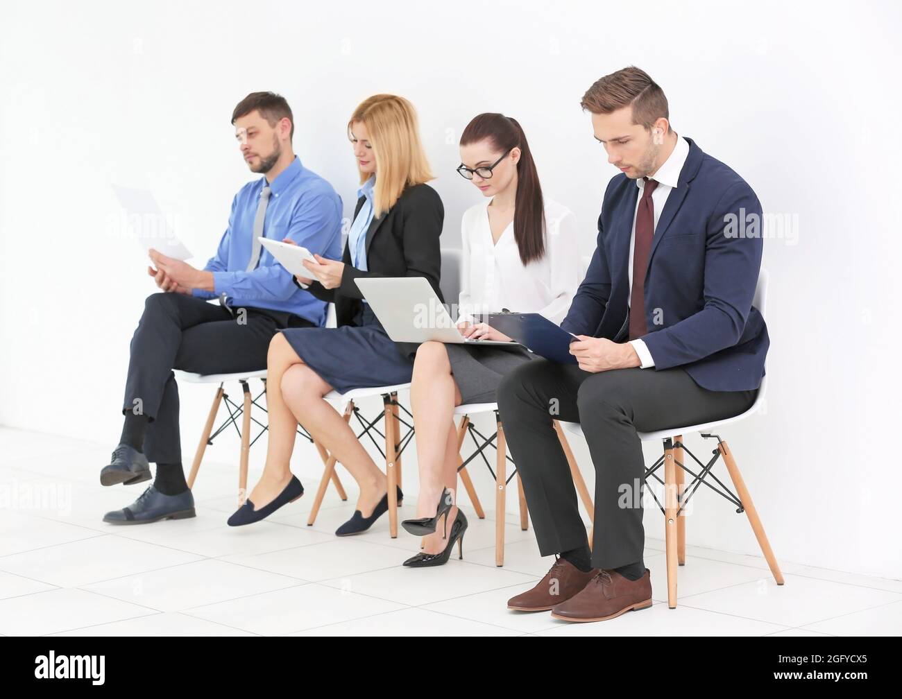 Group of people waiting for job interview on white background Stock ...
