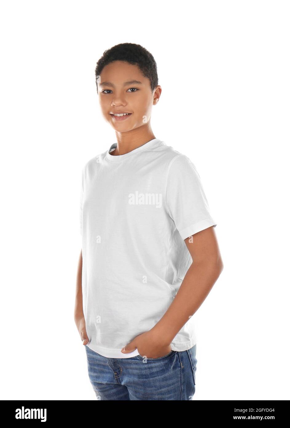 Young African American boy in blank white t-shirt standing on white ...