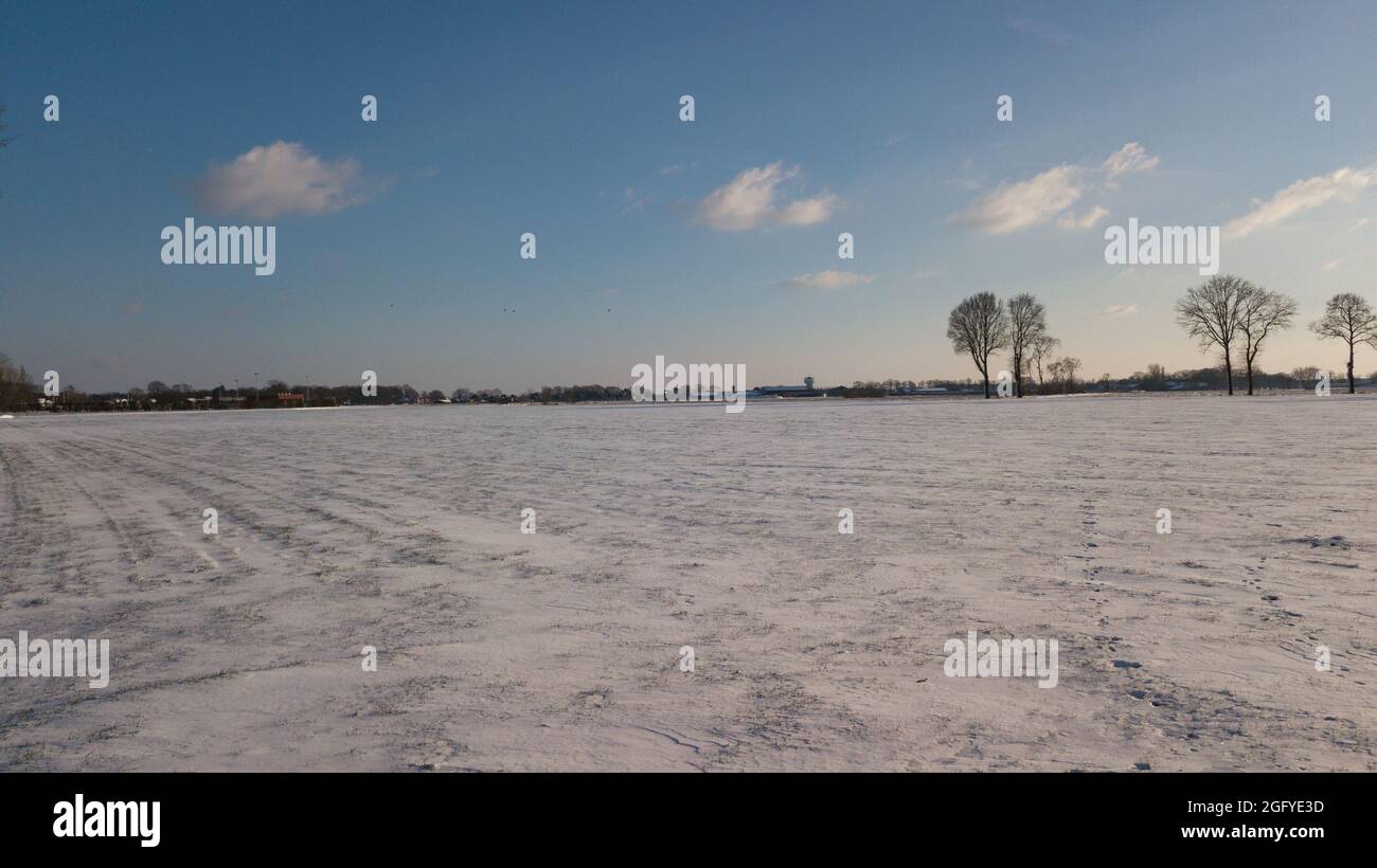 Aerial view with a drone of a spring wavy agricultural countryside ...