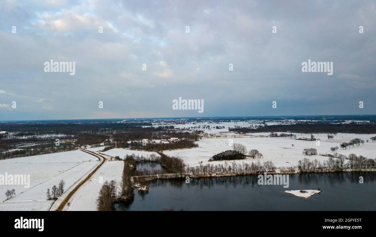 Aerial view with a drone of a spring wavy agricultural countryside ...