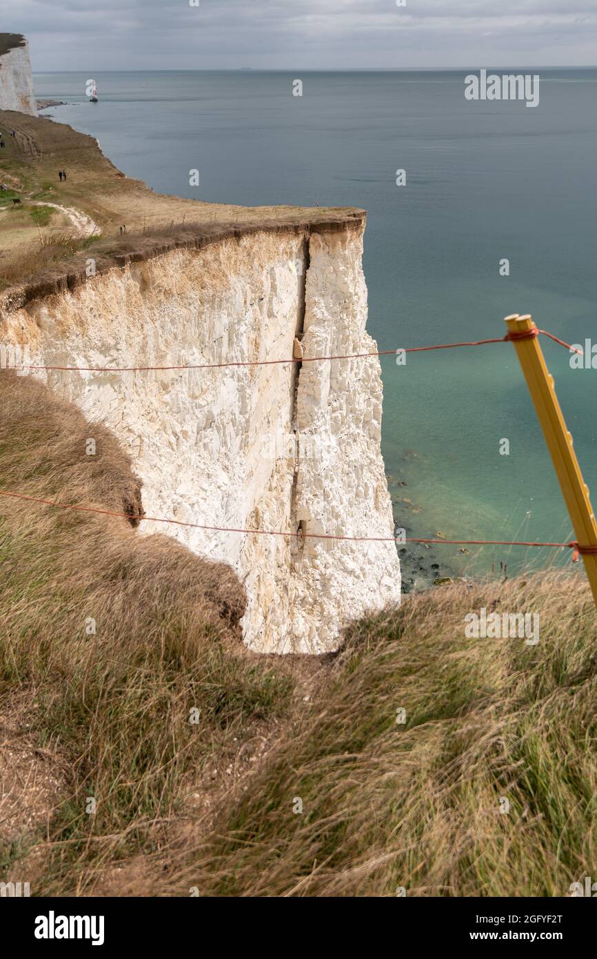A precarious segment of cliff on the verge of collapse is a “vivid ...