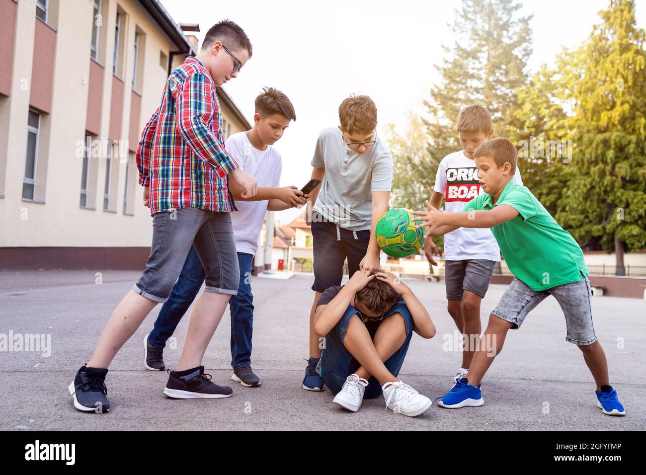 Boy bully phone hi-res stock photography and images - Alamy