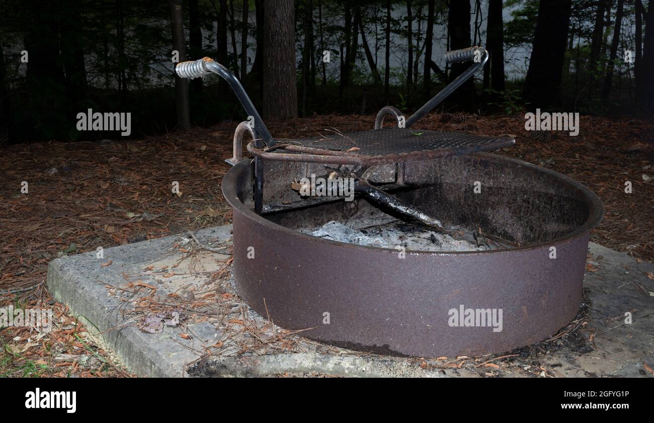 Traditional fire ring and grill near a lakeside campground in North ...
