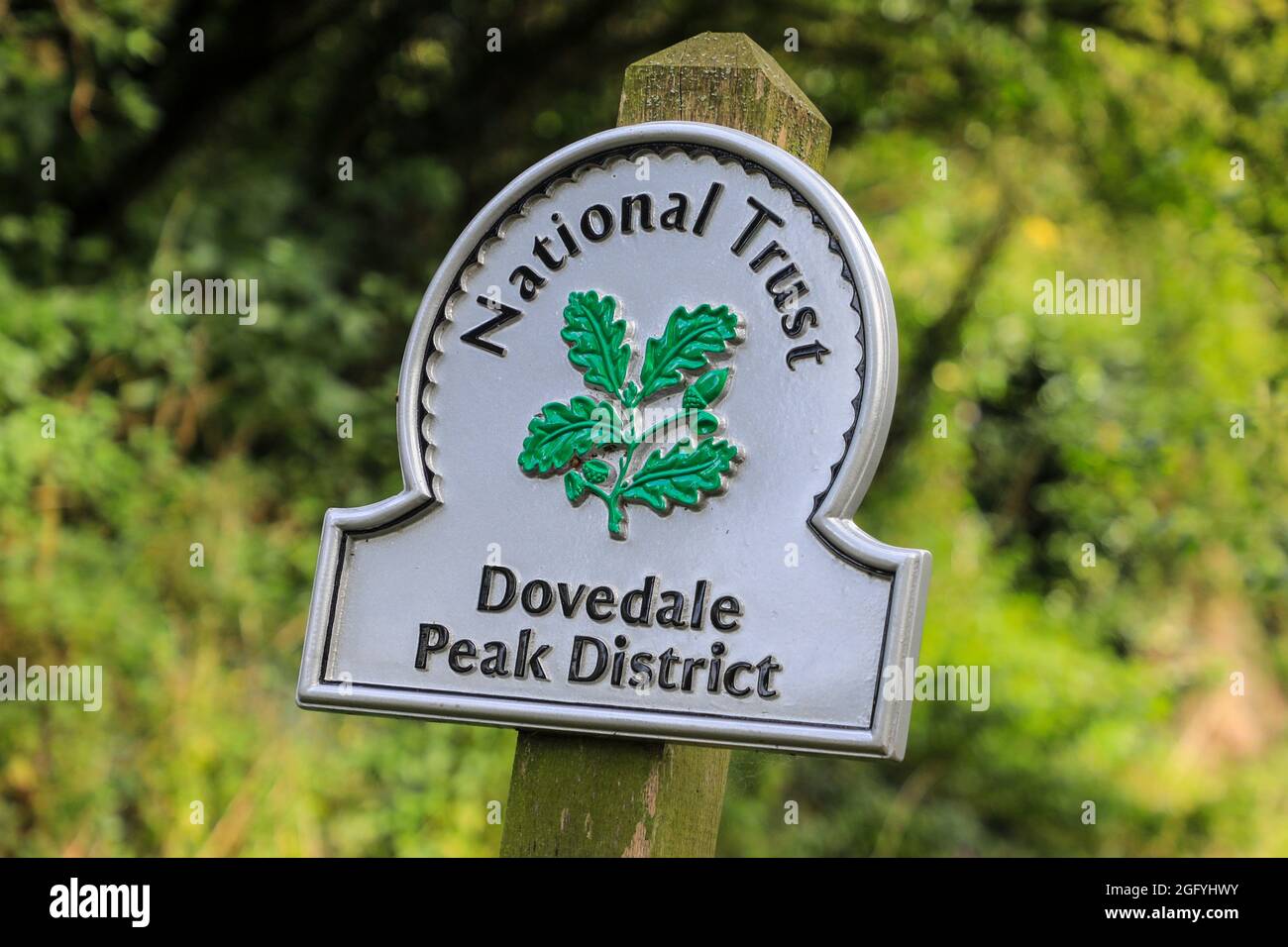 A National Trust omega sign at Dovedale in the Derbyshire and ...