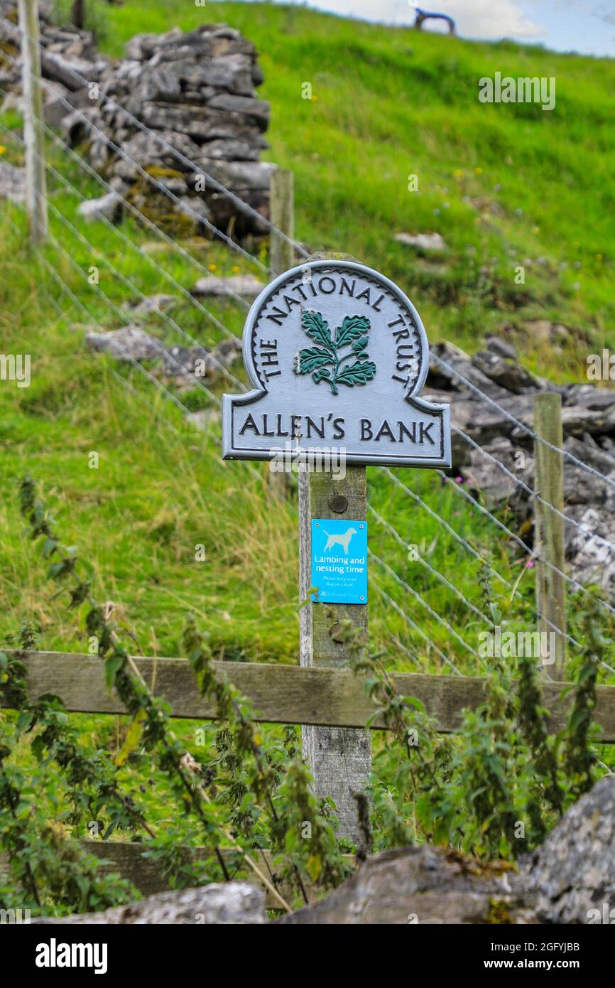 A National Trust omega sign at Allen's Bank in the Derbyshire Peak ...