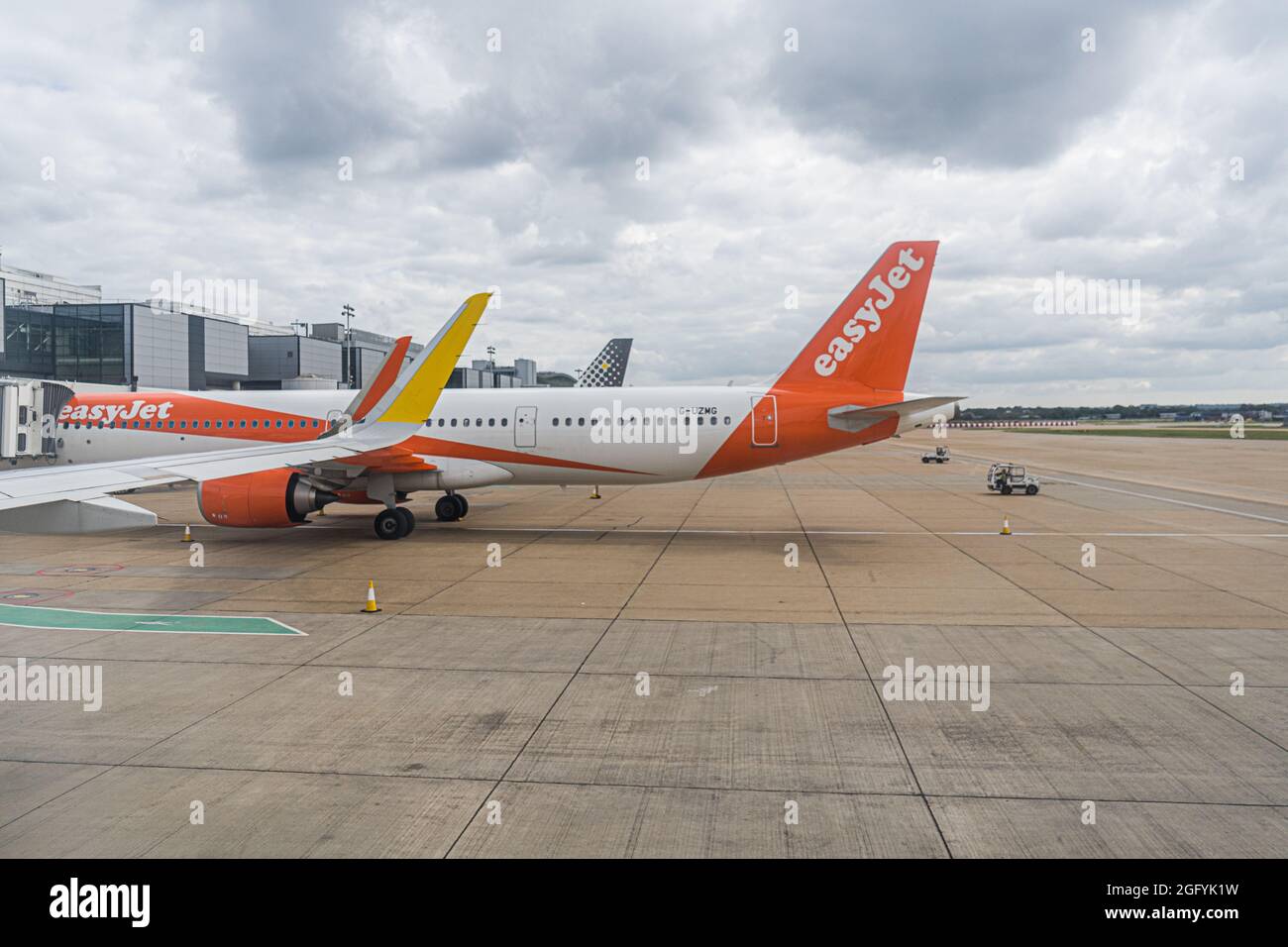 Gatwick Airport, UK : Easyjet airplanes at Gatwick Airport gates Stock ...