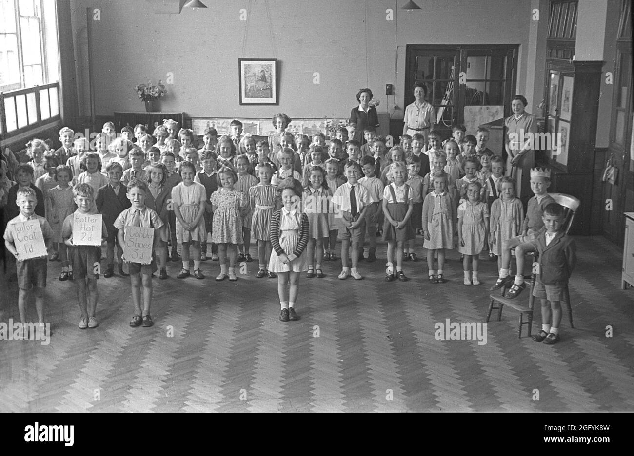 1955, historical, young children in an assembly at a Primary school ...